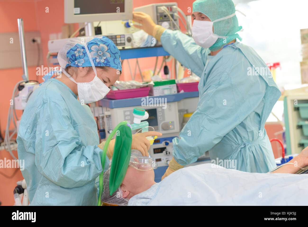 Operation in progress in hospital theatre Stock Photo - Alamy