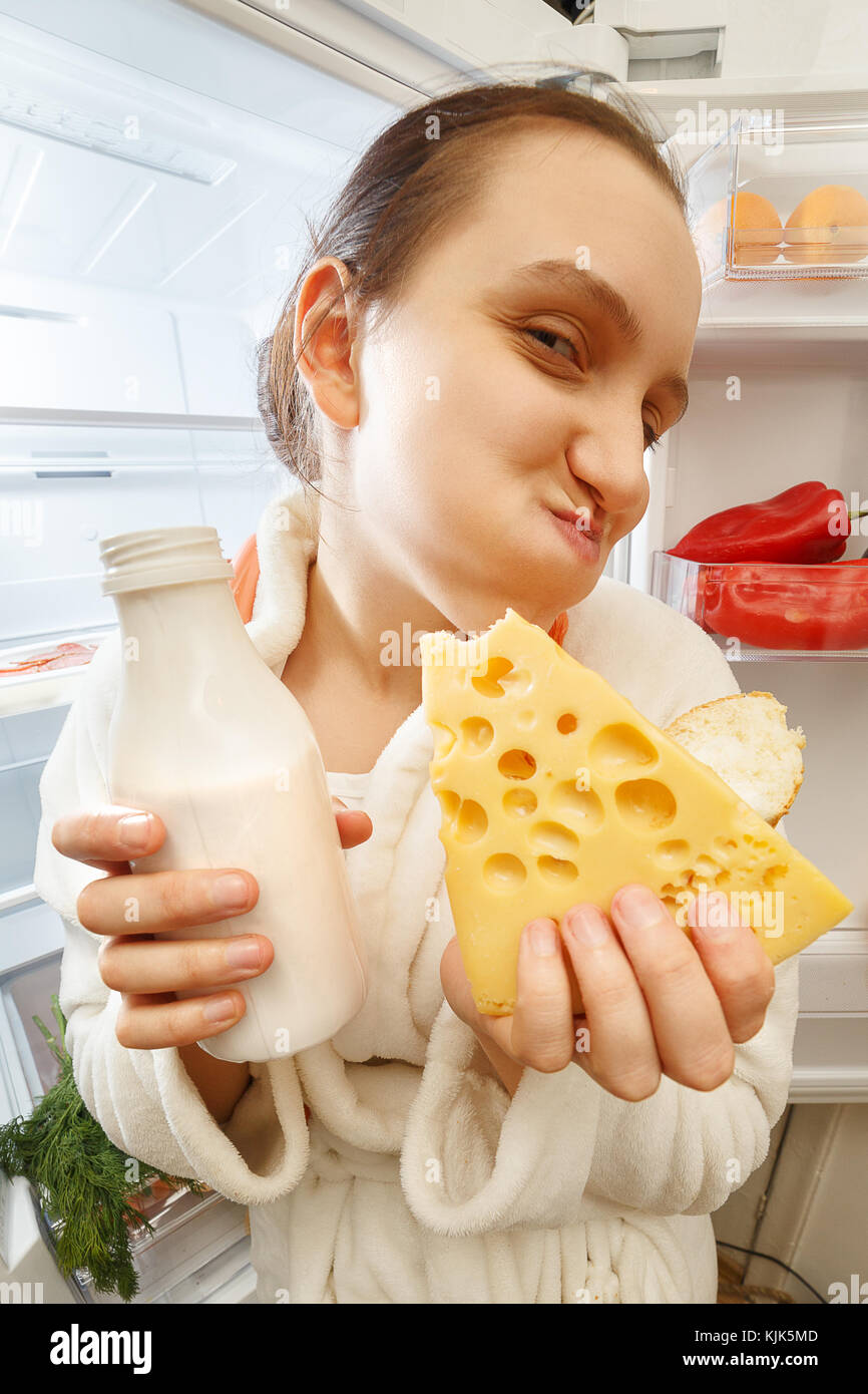Hungry woman eating hi-res stock photography and images - Alamy