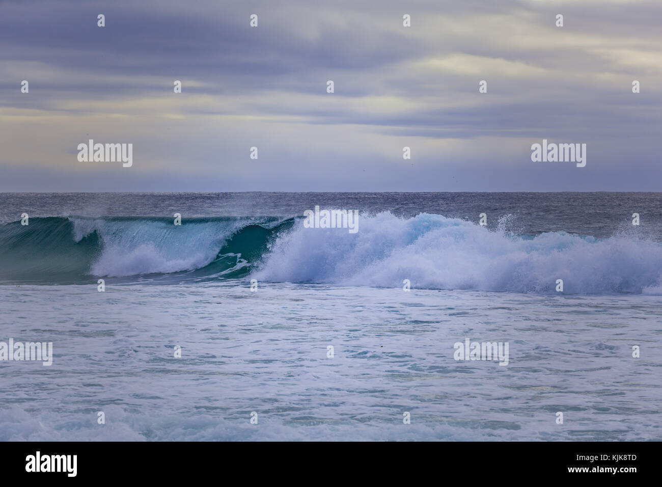 Breaking ocean wave - minimalist landscape, nothing but ocean and sky ...