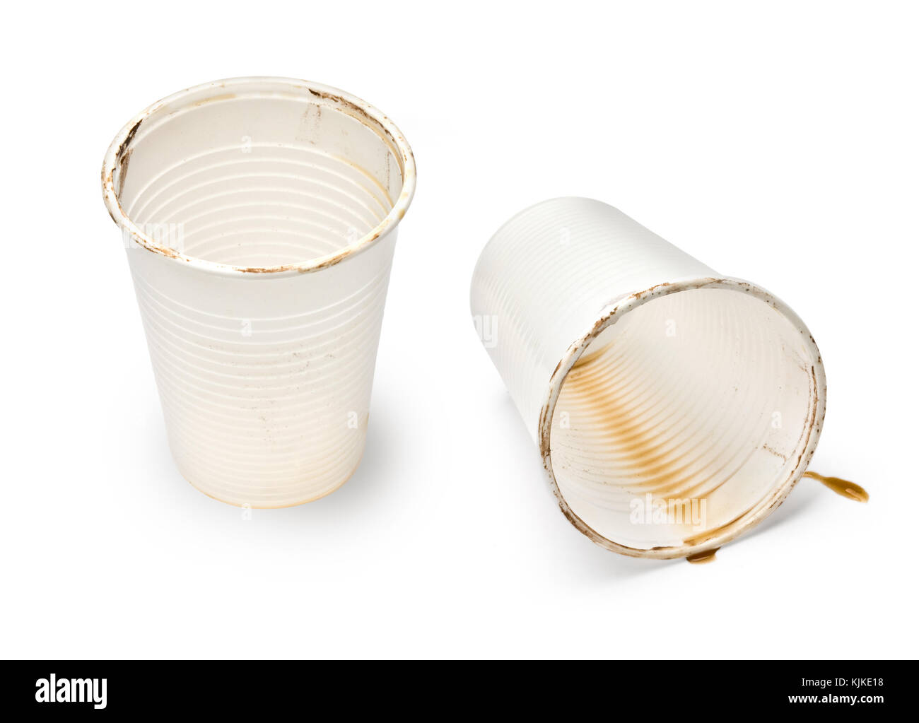 close up of empty used coffee cups on white background Stock Photo - Alamy