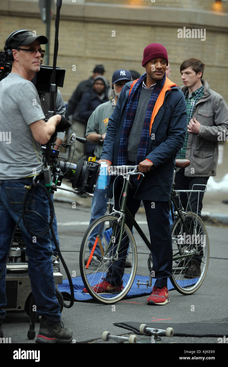 Will smith rides a bike on the set of hi-res stock photography and ...