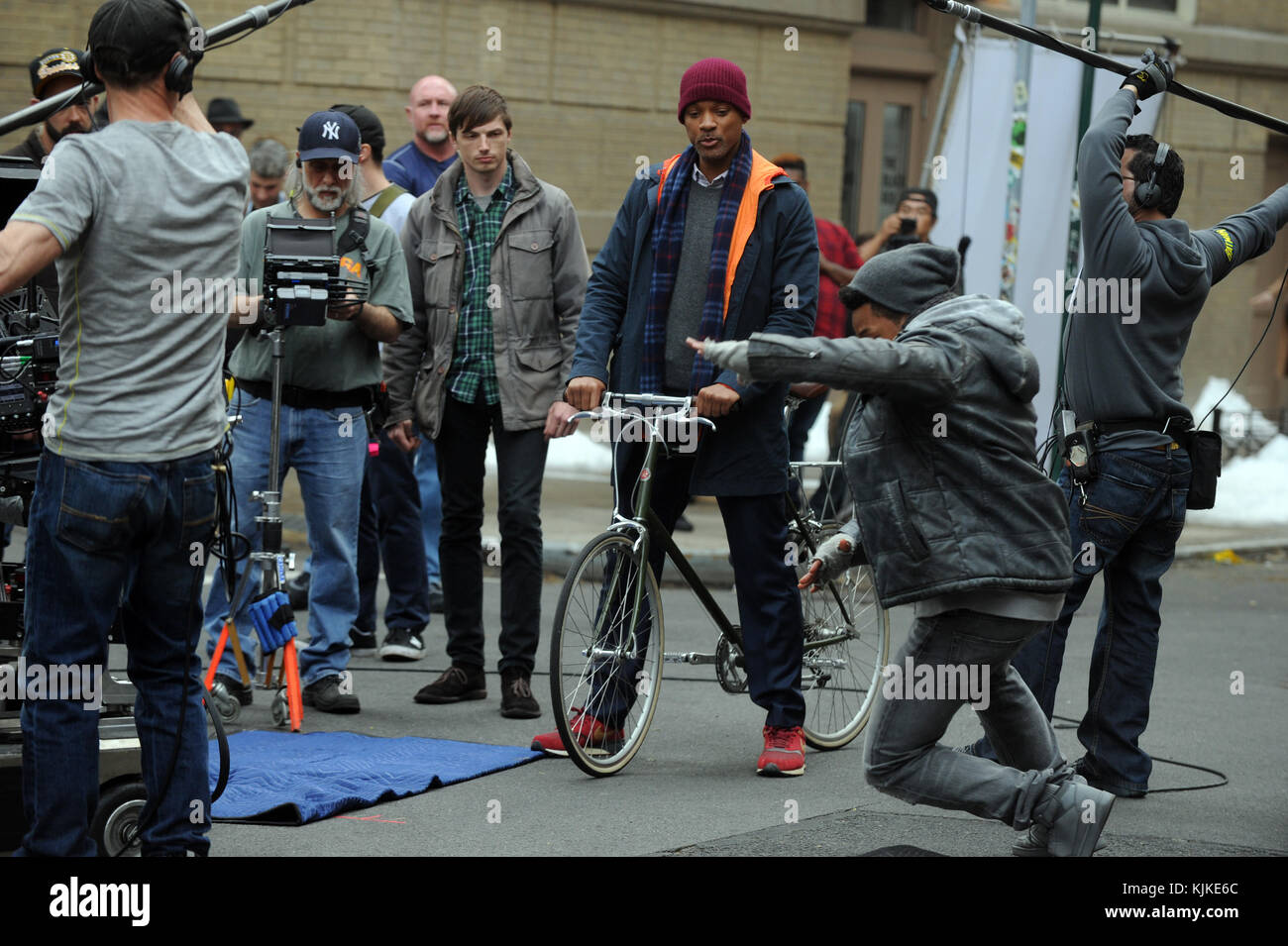 Will smith rides a bike on the set of hi-res stock photography and ...