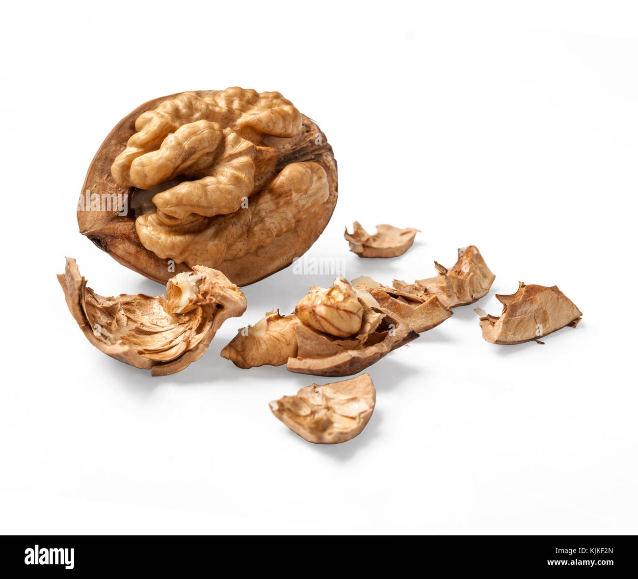 cracked walnut isolated on the white background. with clipping path ...