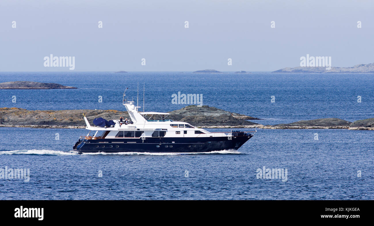 NORTH SEA, NORWAY ON JULY 04, 2010. Yacht cruising in the inlet ...