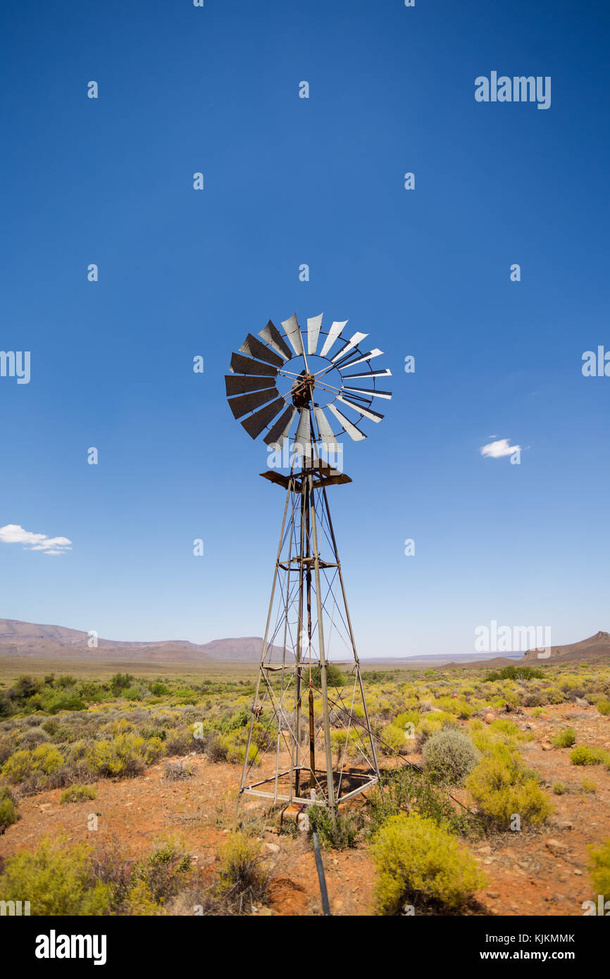 Close up wide angle image of a windmill / windpomp with static blades ...