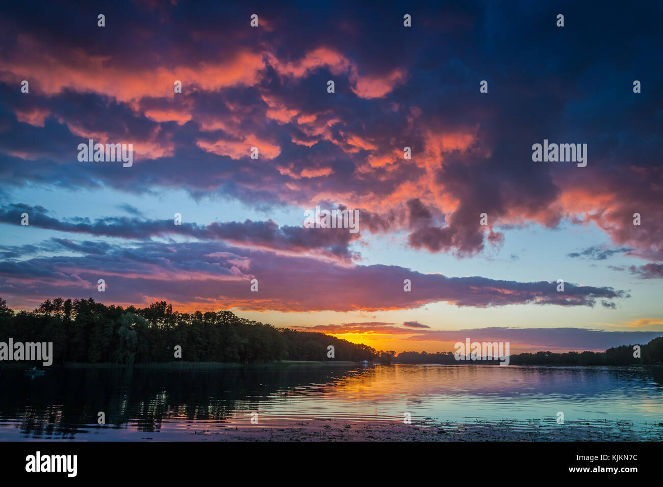 Stunning dusk at the lake with dynamic sky, Europe Stock Photo - Alamy