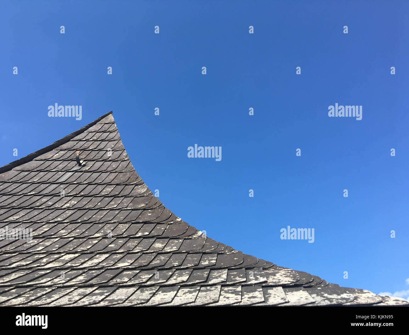 A roof from the Salzburg Castle against the blue sky; picture taken in ...