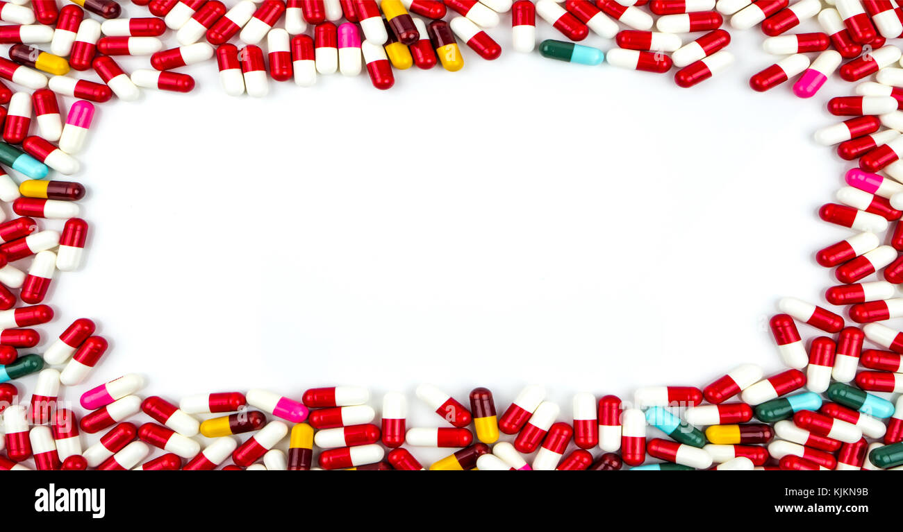 Colorful of antibiotics capsule pills rectangle frame on white ...