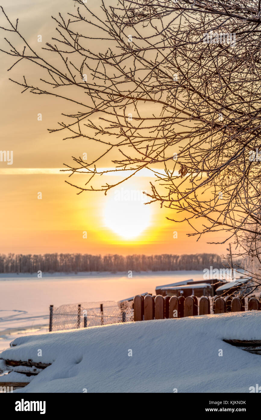 Sunset over the garden Stock Photo - Alamy