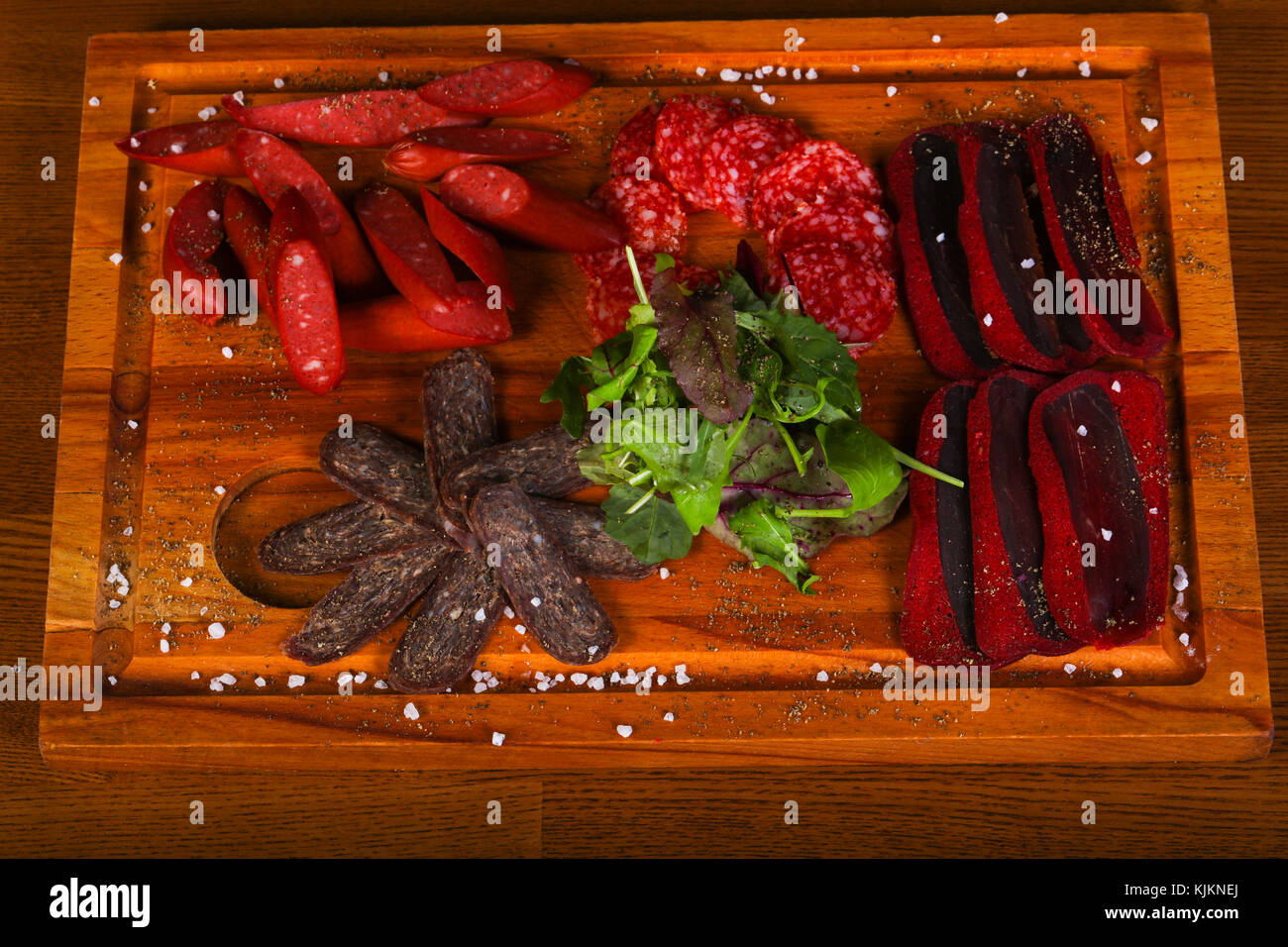 Sausages plate mix snack Stock Photo - Alamy