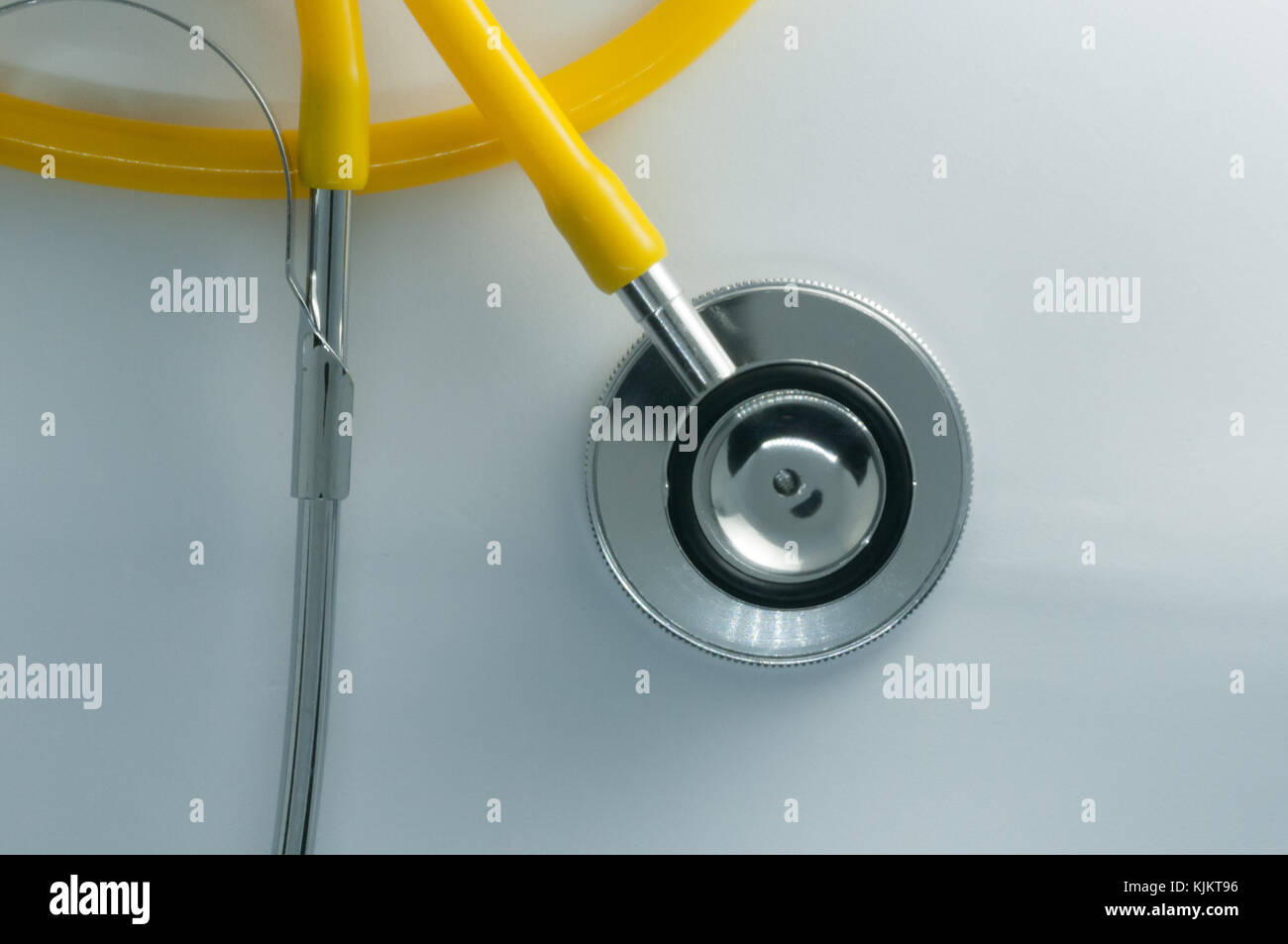 Yellow Stethoscope on a white background Stock Photo - Alamy