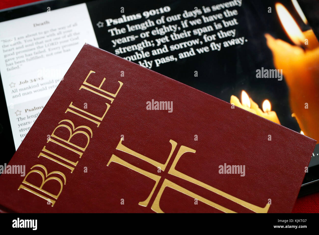 The Holy Bible on paper and Ipad Stock Photo - Alamy
