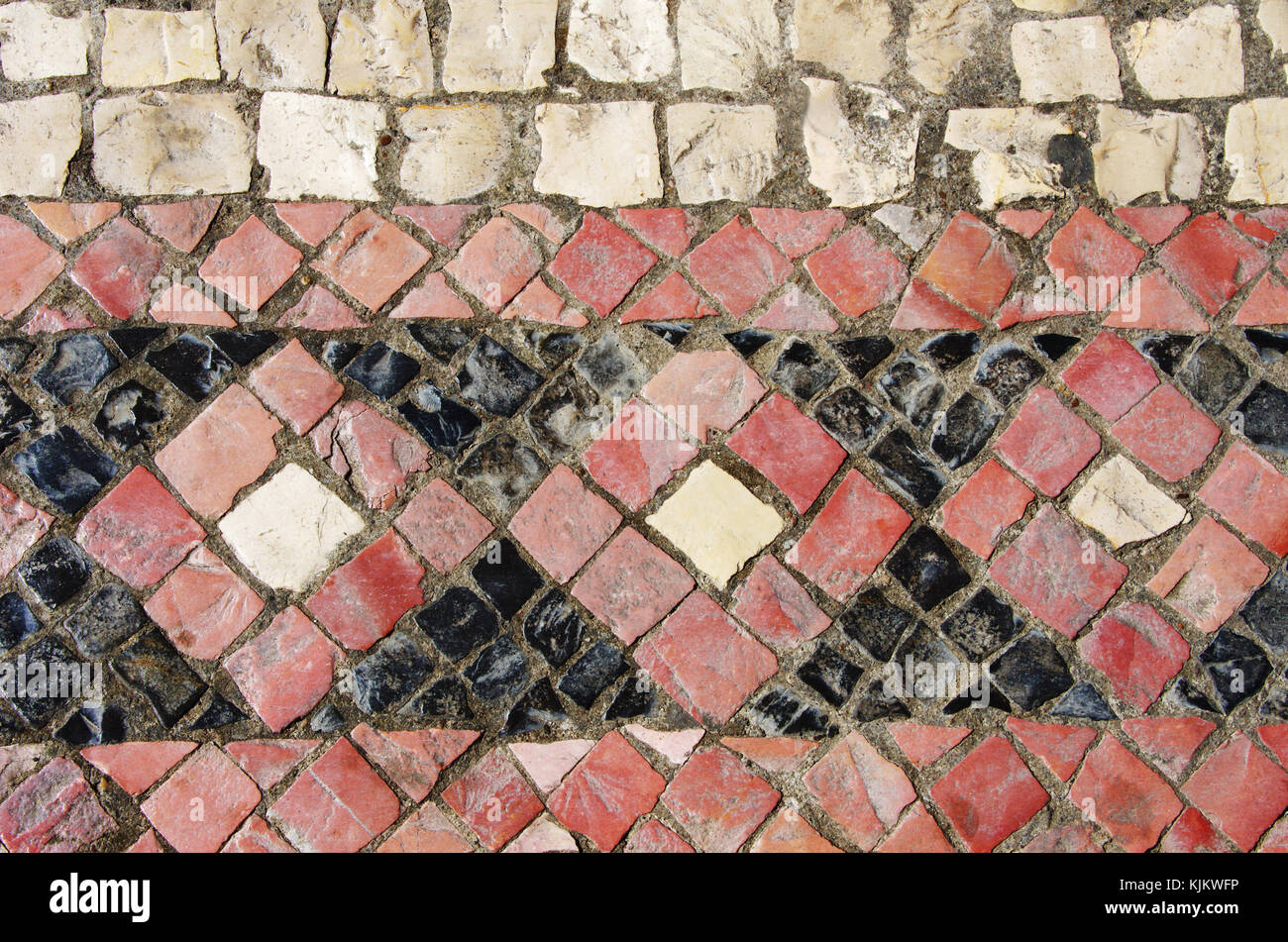 typical Portuguese "calcada" stone mosaic Stock Photo - Alamy