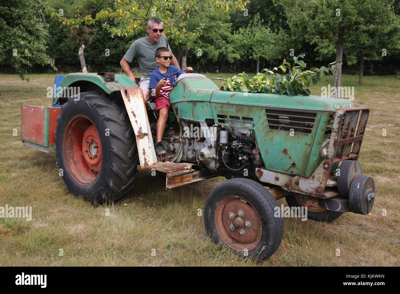 Man driving tractor hi-res stock photography and images - Alamy