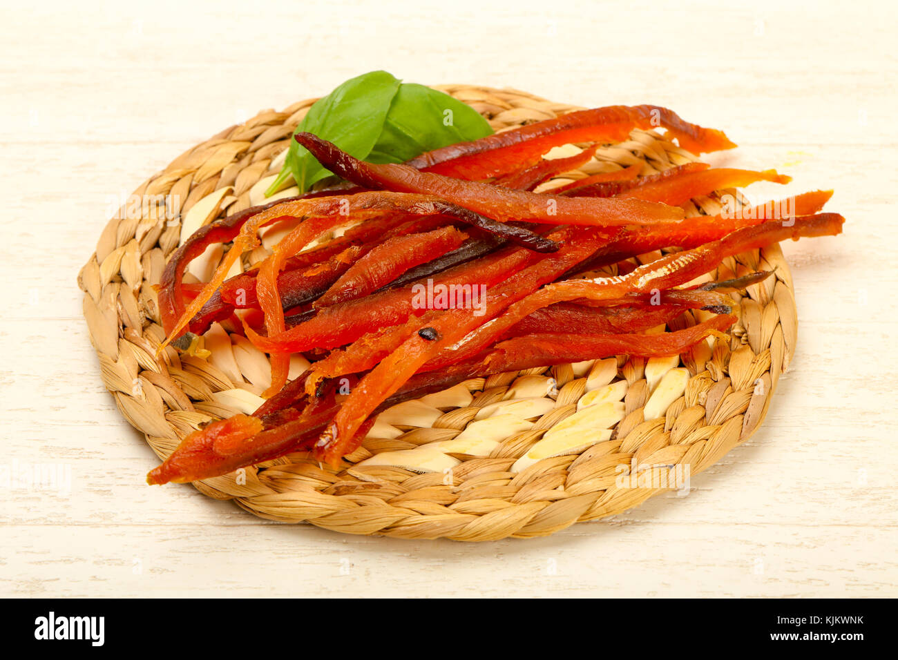 Salmon dry sticks snack Stock Photo - Alamy
