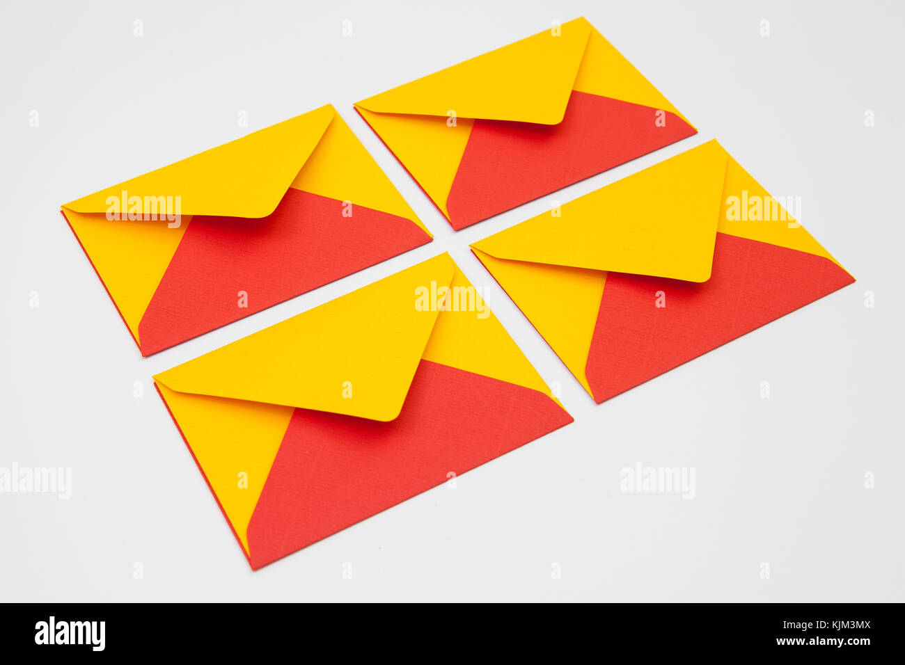 Different colored envelopes on the table Stock Photo - Alamy