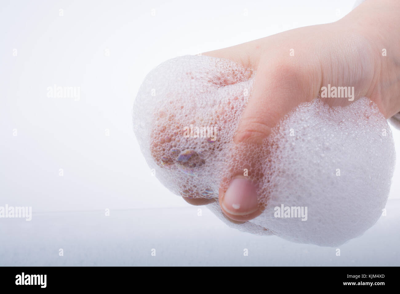 Hand washing and soap foam on a foamy background Stock Photo - Alamy