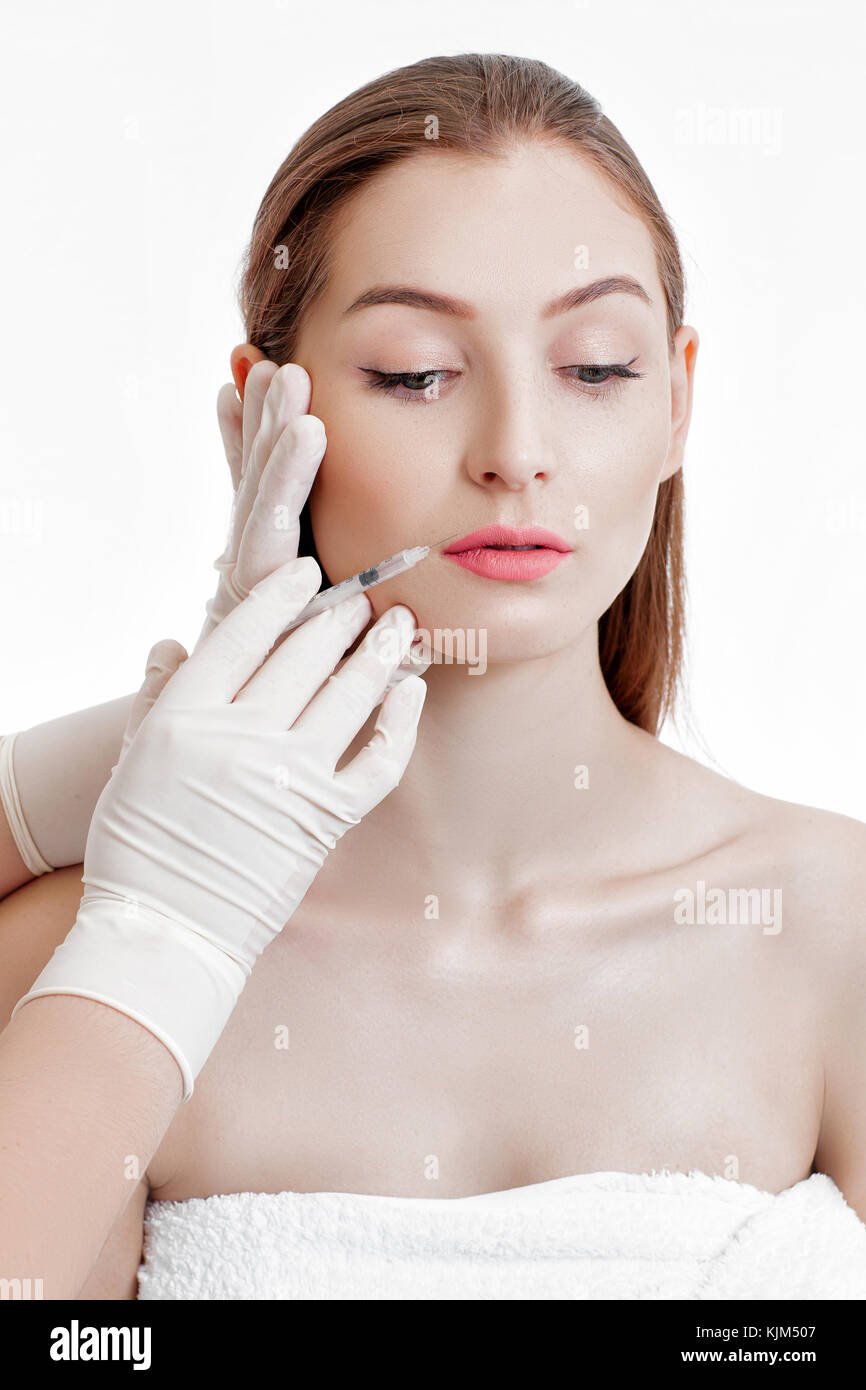 woman getting injection on lips Stock Photo - Alamy