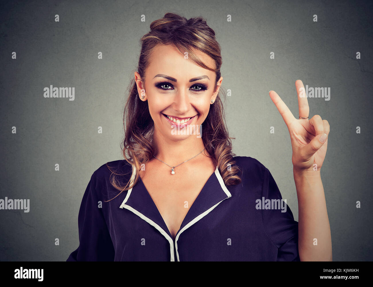 Peace sign hand woman hi-res stock photography and images - Alamy