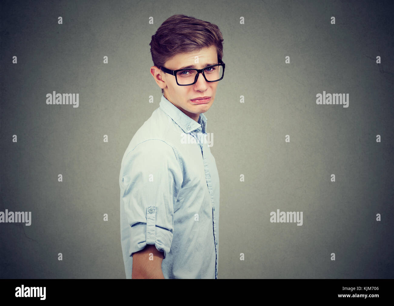 Sad, disgusted funny looking man Stock Photo - Alamy
