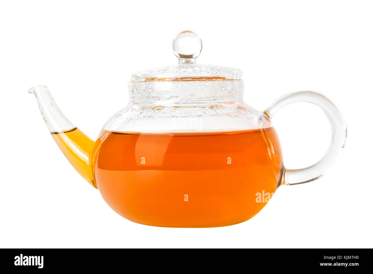 A photo of a teapot full of vibrant tea, isolated on a white background ...