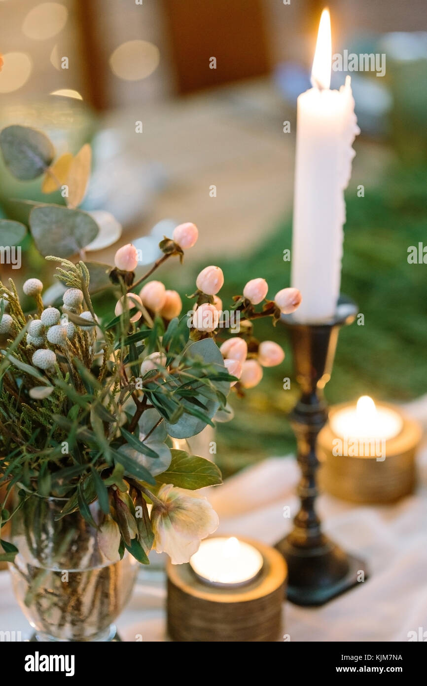 decoration, planting, wedding concept. on the table there is small posy ...