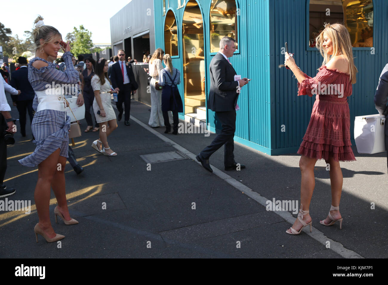 Nicky Brownless takes a photo of daughter Lucy Brownless at Oaks Day at ...
