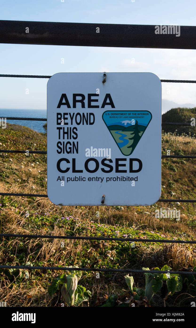 Area Closed Warning Sign keeps people away from fragile cliffs Stock ...
