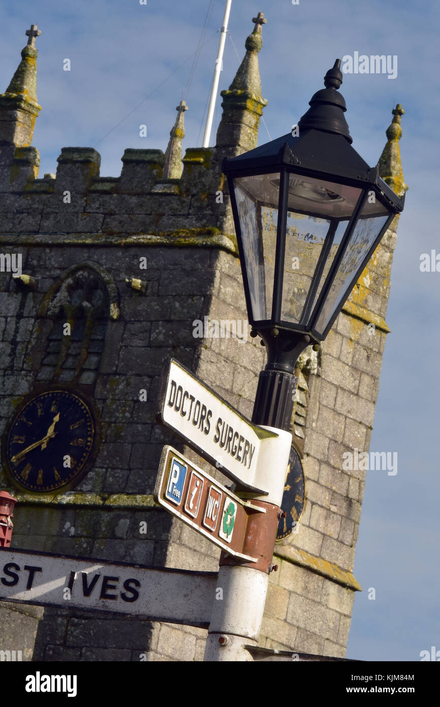 The signpost in the village square at Saint Just in Cornwall with a ...