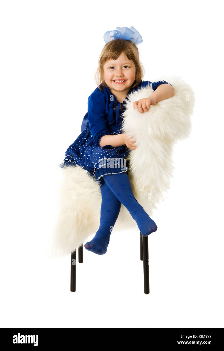Happy girl smiling sitting isolated on white Stock Photo - Alamy