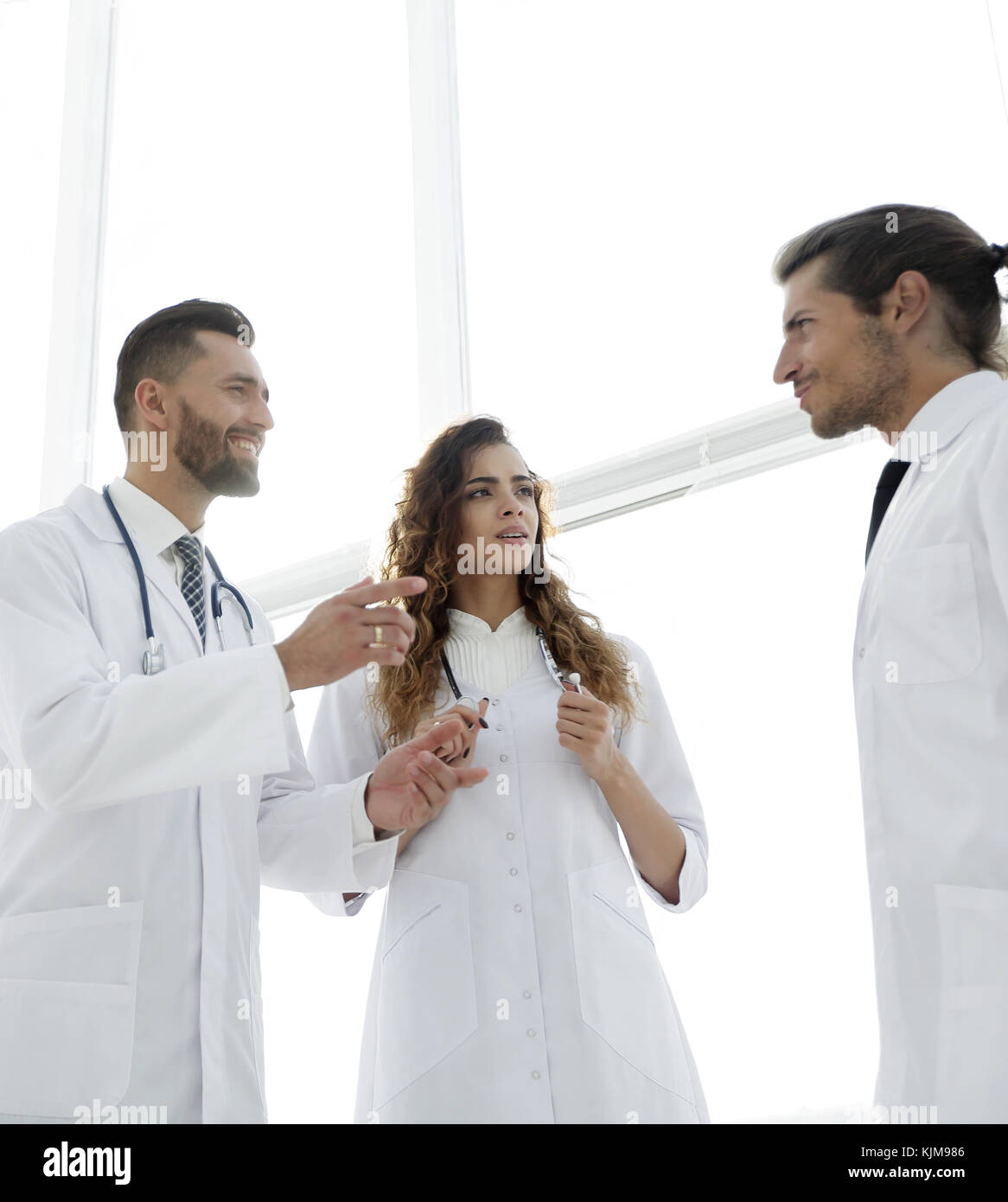 group of doctors discussing in hospital Stock Photo - Alamy