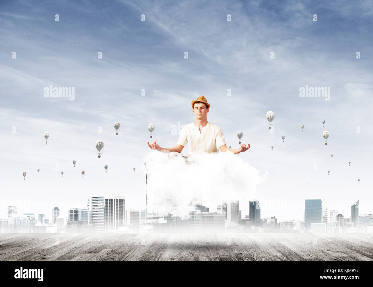 Young man keeping mind conscious Stock Photo - Alamy