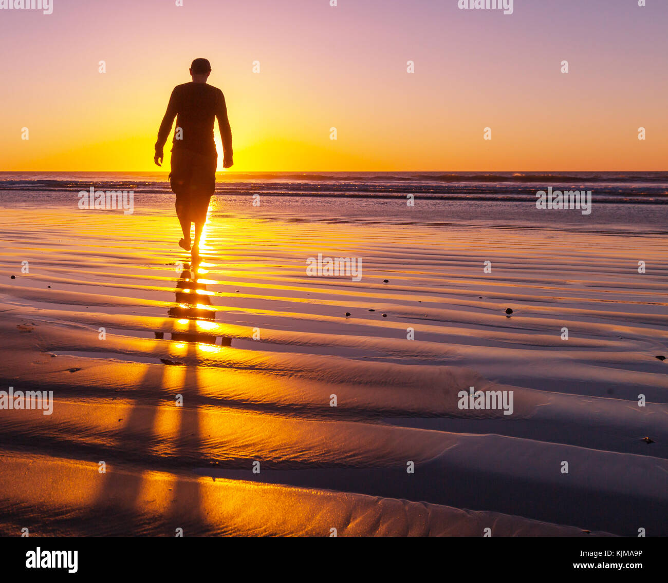 man on the beach Stock Photo - Alamy