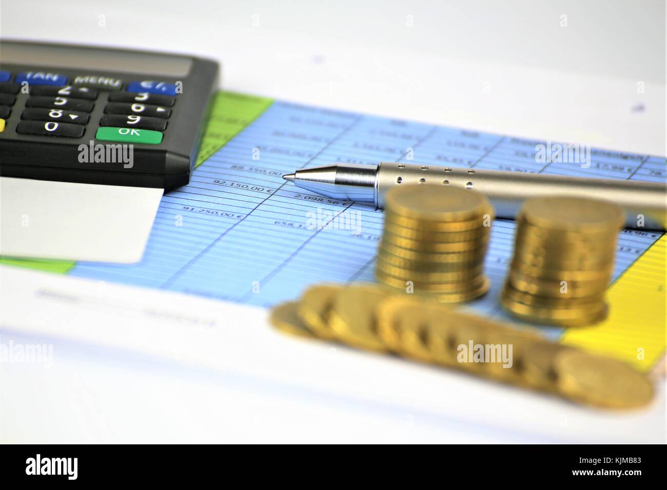 An concept Image of a credit Card, Money, pen and a calculation Stock ...