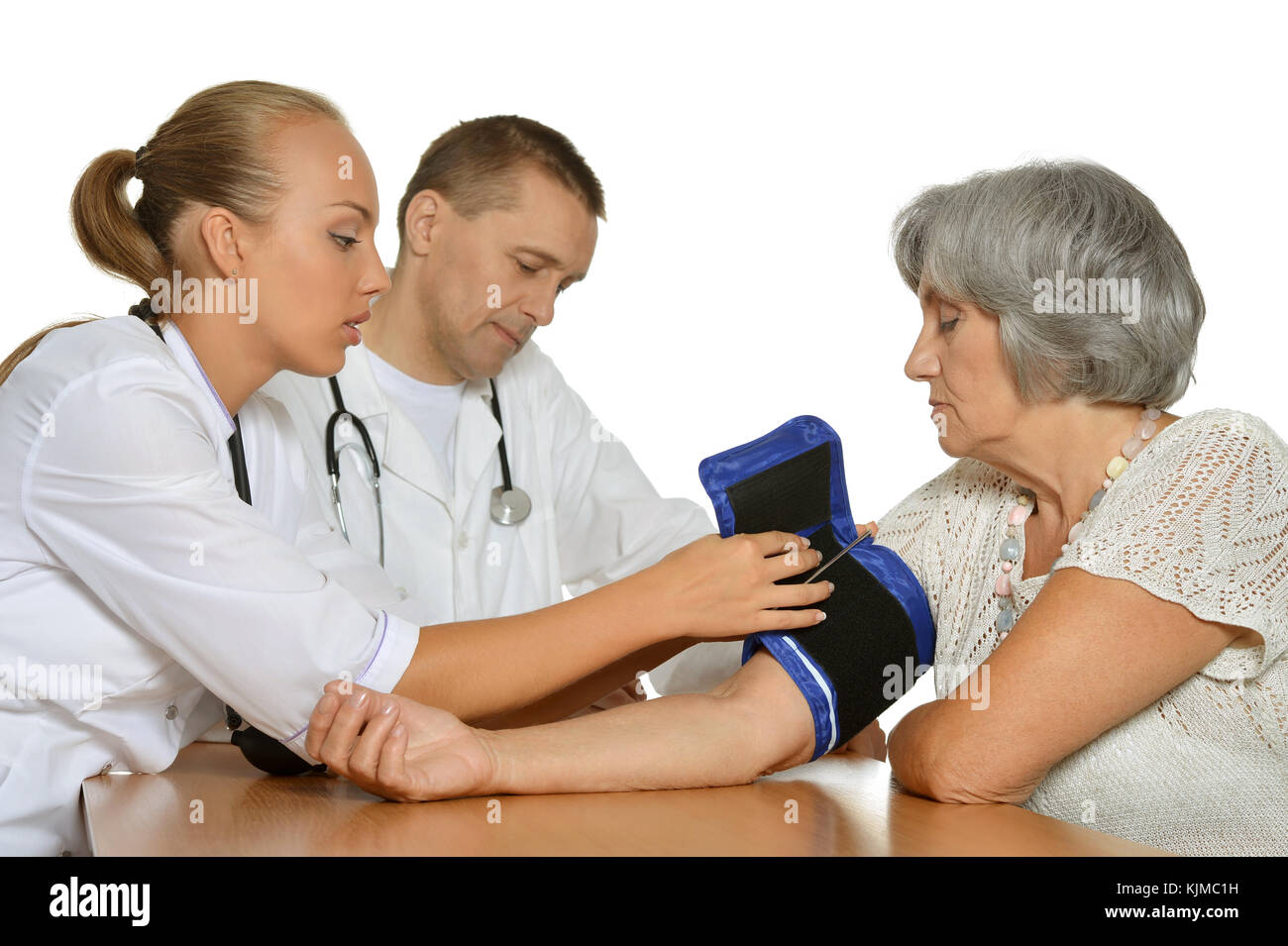 doctors working with patient Stock Photo - Alamy