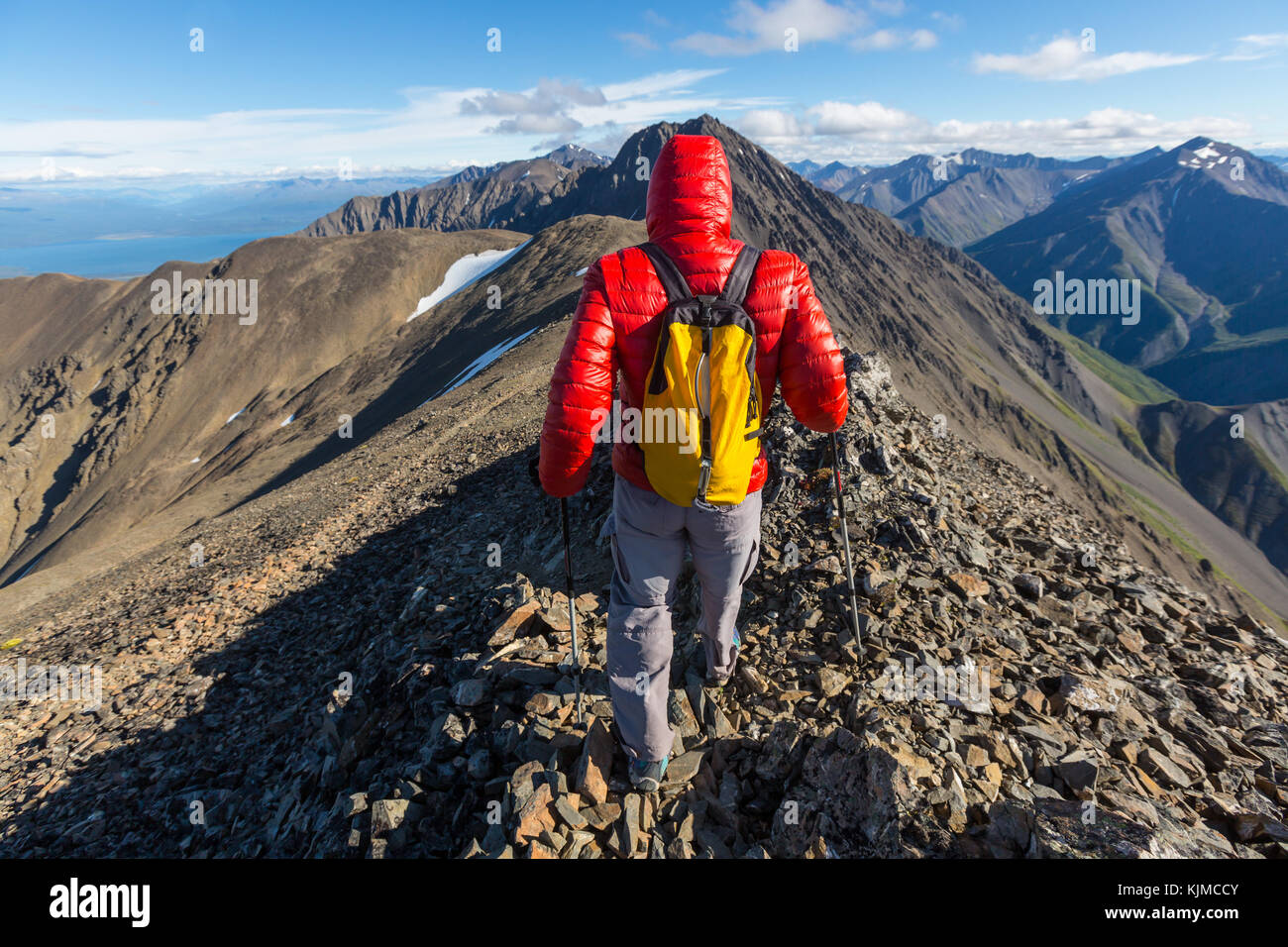 Hiking man in the mountains Stock Photo - Alamy