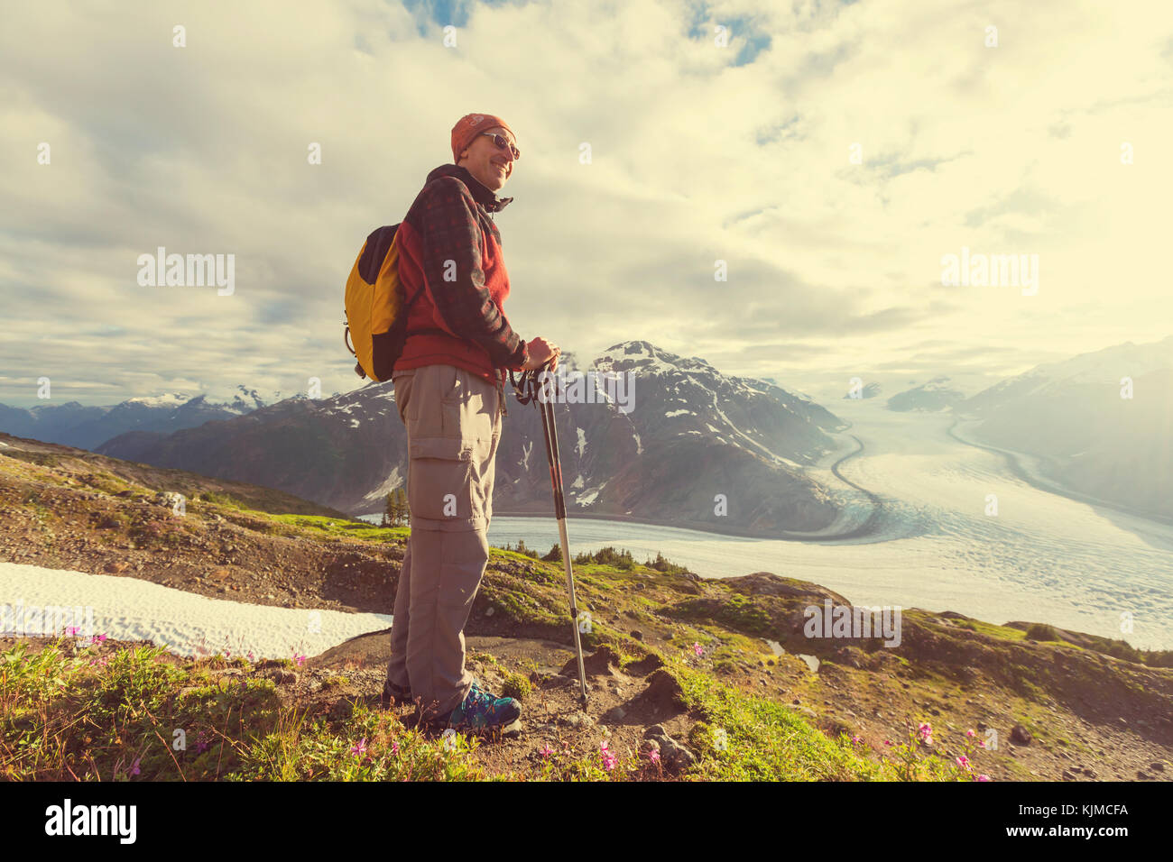 Hiking man in the mountains Stock Photo - Alamy