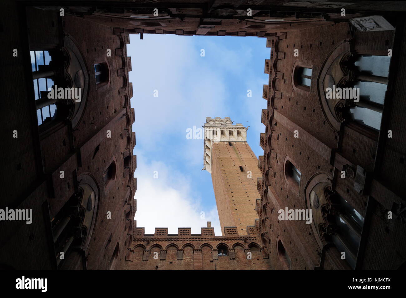 Perspective of an ancient palace in Siena, Italy Stock Photo - Alamy