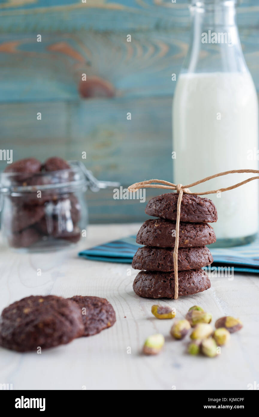 RUSTIC COOKIES COCOA STACKED AND PISTACHIOS Stock Photo - Alamy