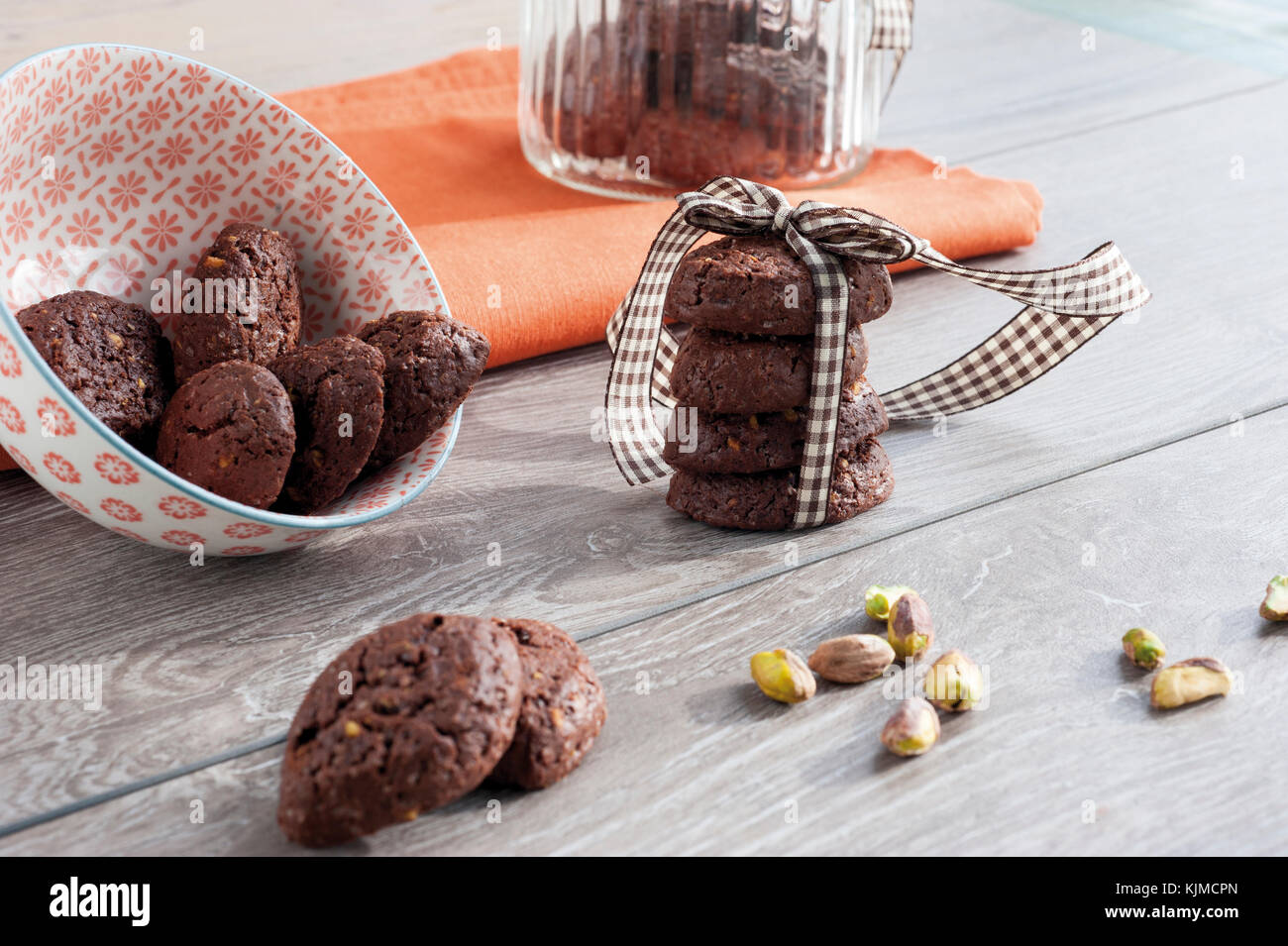 RUSTIC COOKIES COCOA STACKED AND PISTACHIOS Stock Photo - Alamy