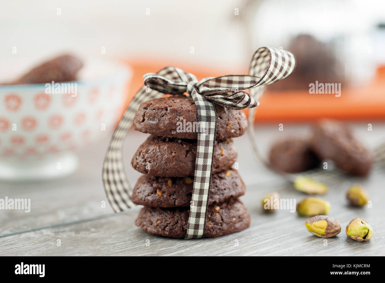 RUSTIC COOKIES COCOA STACKED AND PISTACHIOS Stock Photo - Alamy