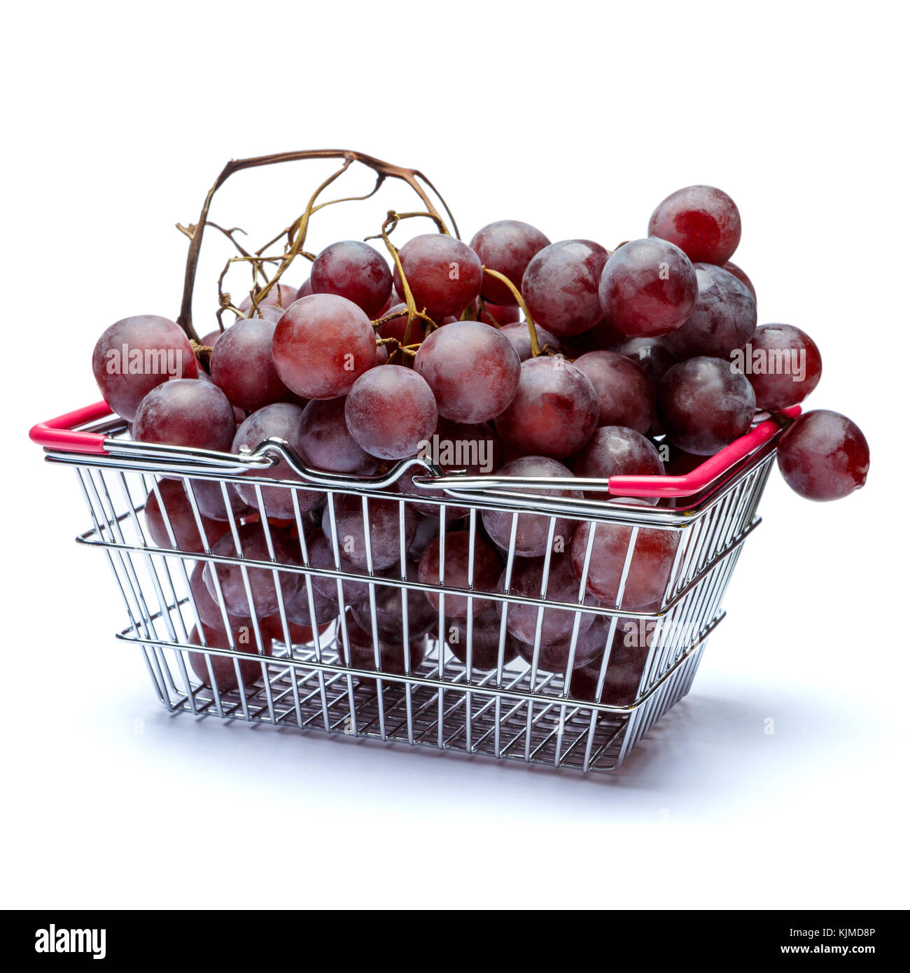 Grapes in shopping cart isolated on white Stock Photo - Alamy
