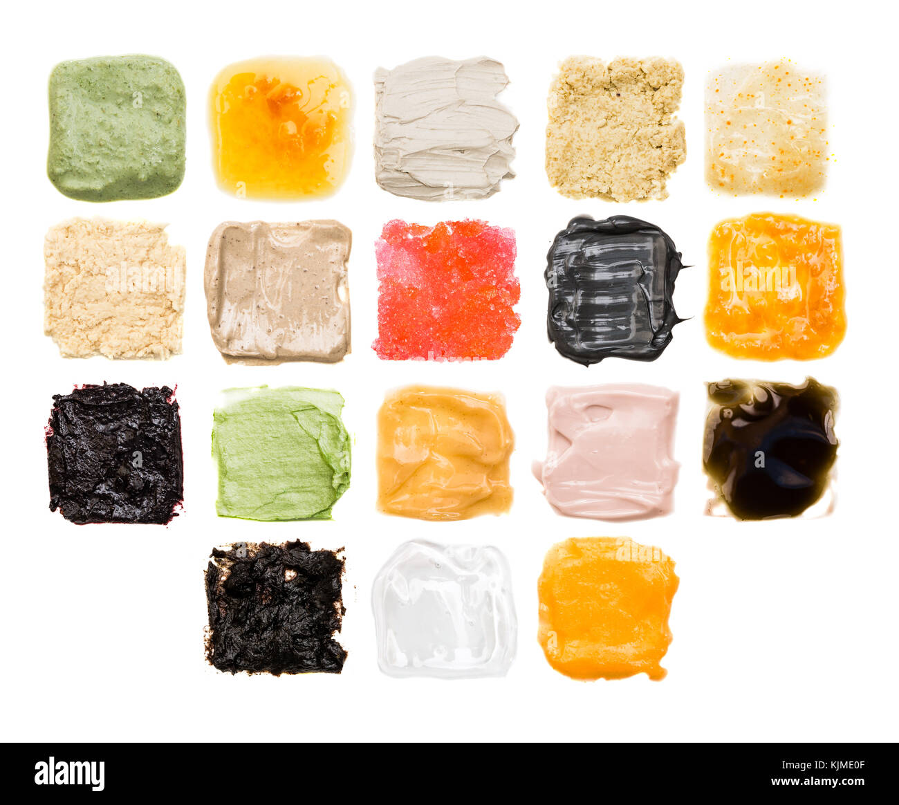 A lot of samples of different textures of cosmetics on white background ...
