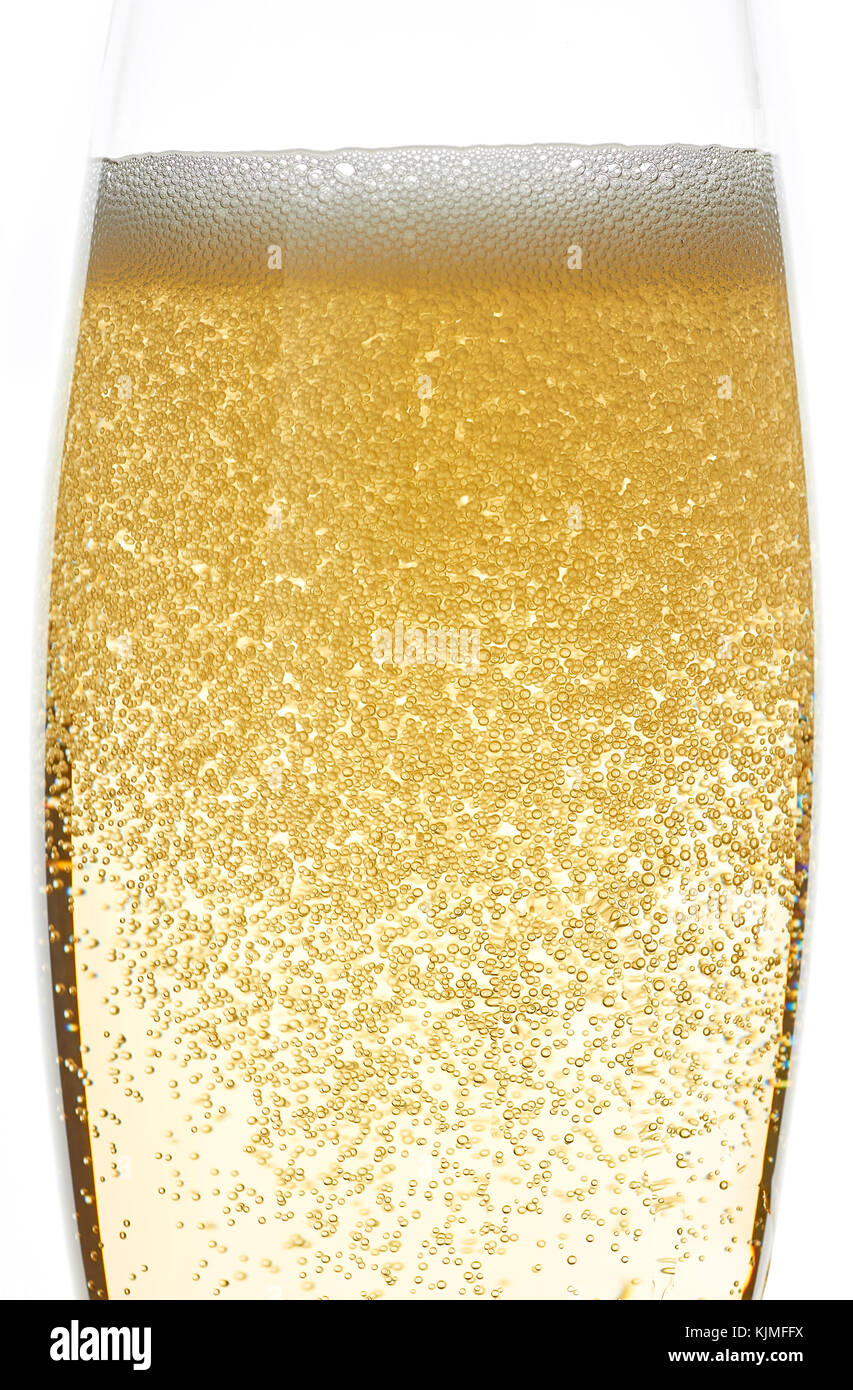 Champagne foam and bubbles in the glass closeup Stock Photo - Alamy