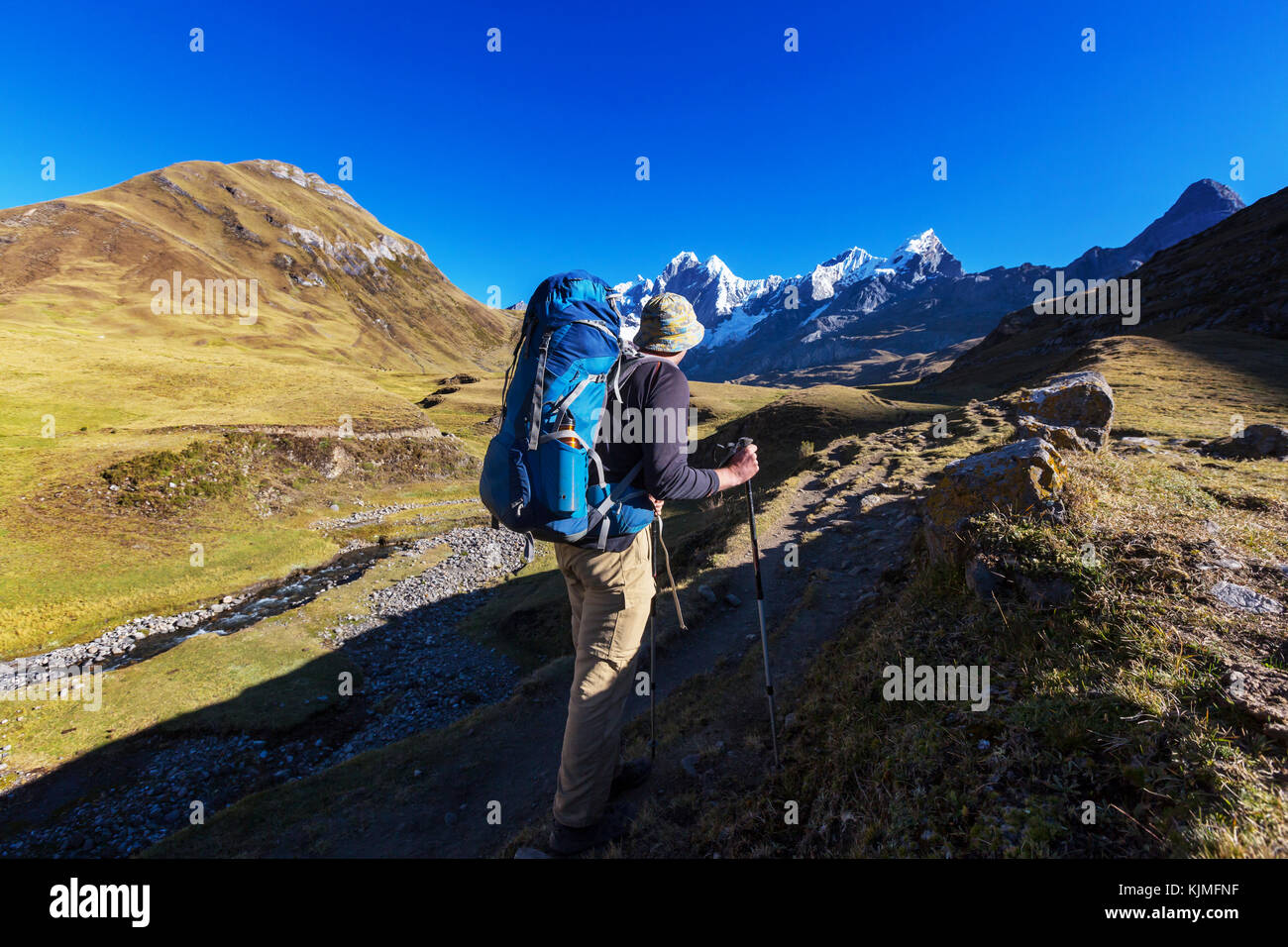 Hiking scene in Cordillera mountains, Peru Stock Photo - Alamy