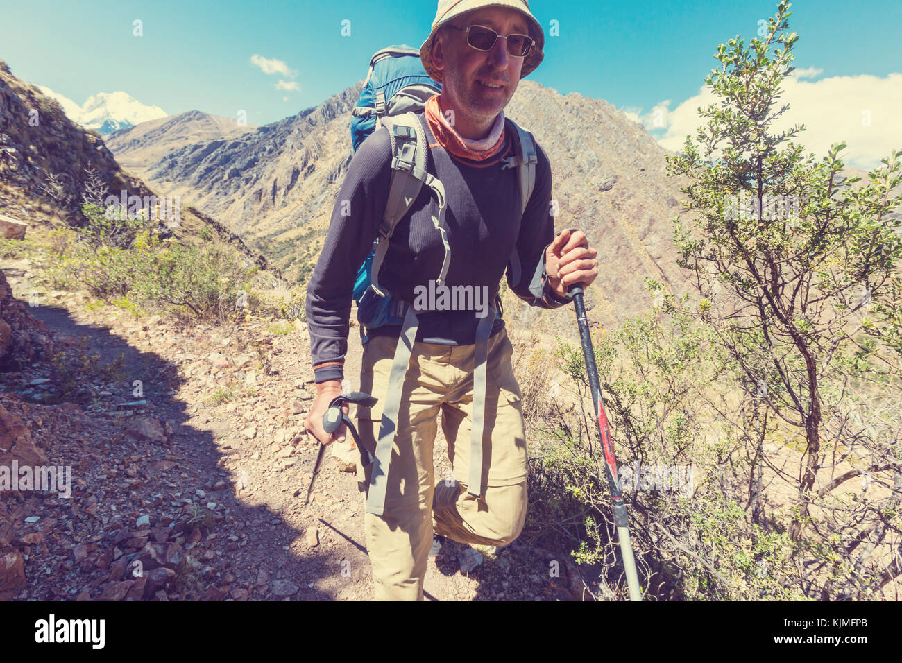 Hiking scene in Cordillera mountains, Peru Stock Photo - Alamy