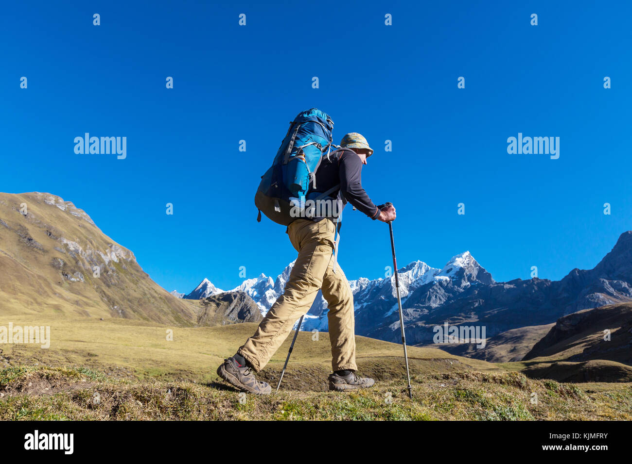 Hiking scene in Cordillera mountains, Peru Stock Photo - Alamy
