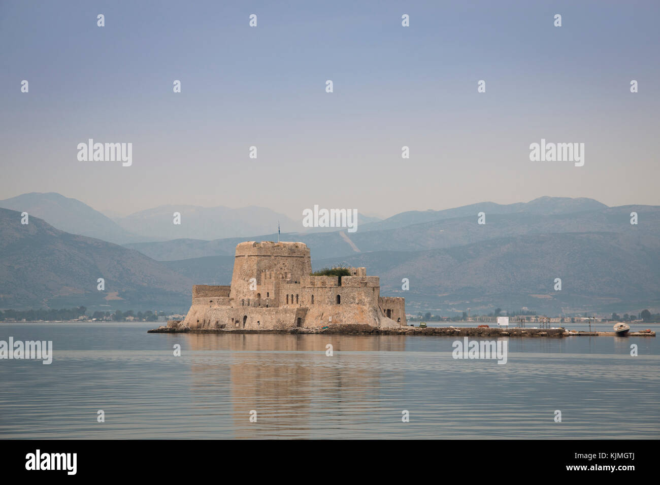 The Bourtzi water castle is a small island with a fortress at the coast ...