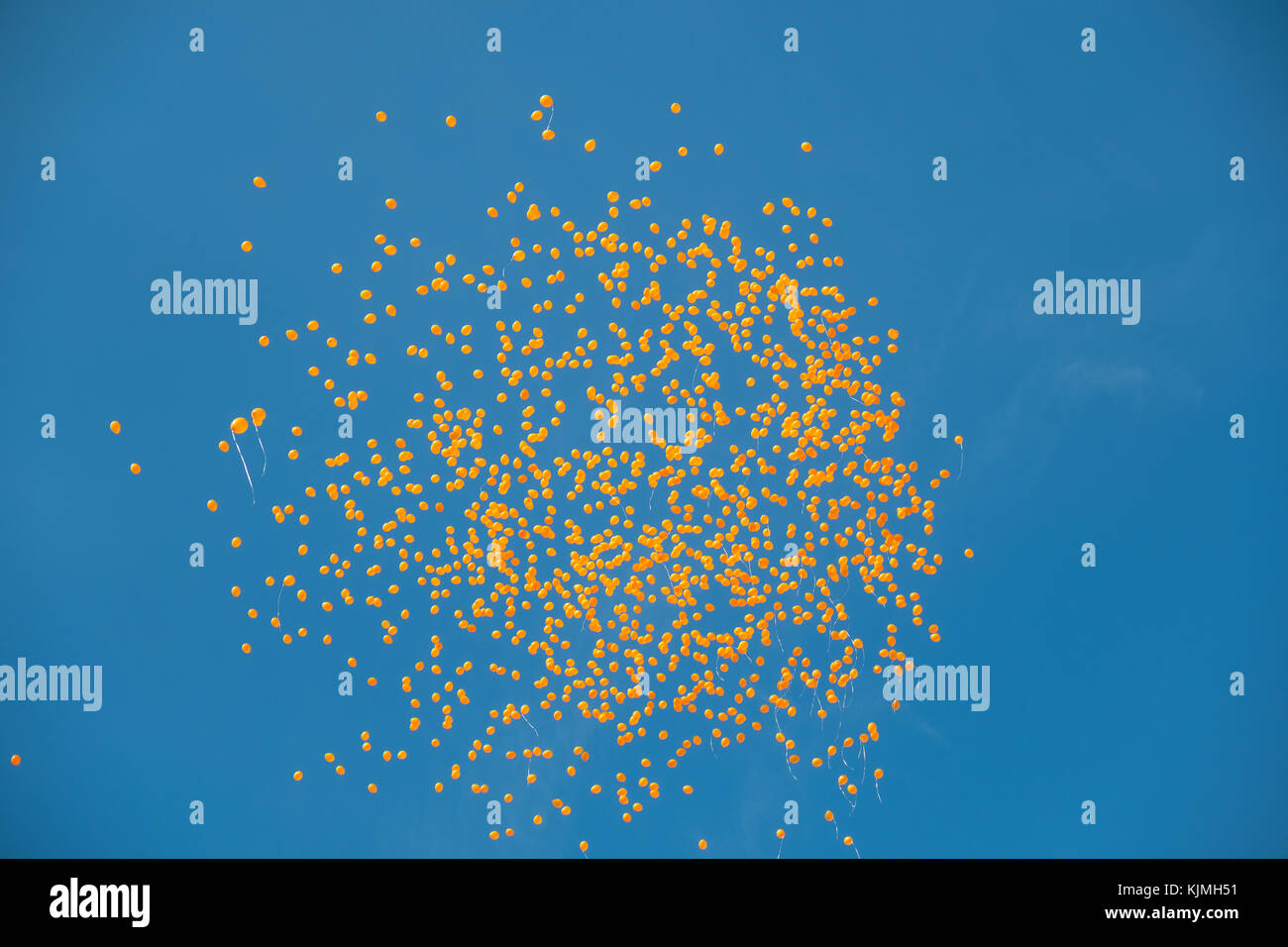 orange ballons flying on the sky Stock Photo - Alamy