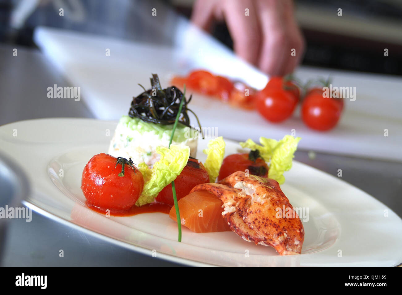 cooking chef preparing seafood starter Stock Photo - Alamy
